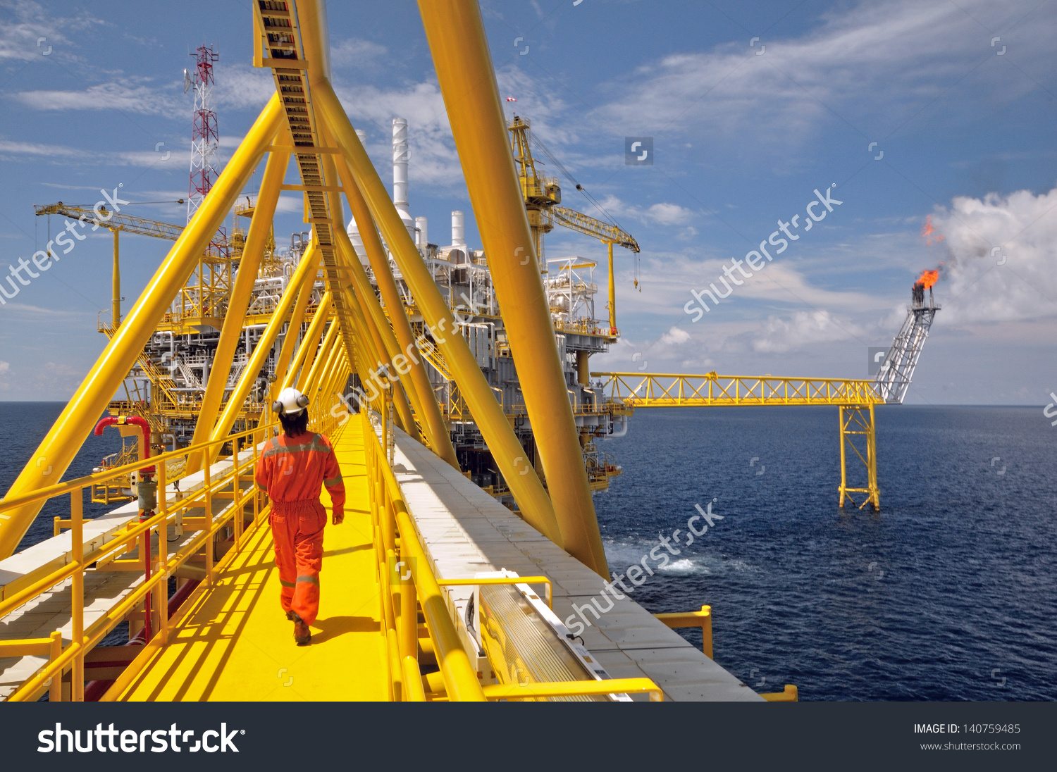 stock-photo-the-gas-flare-is-on-the-oil-rig-platform-in-the-gulf-of ...